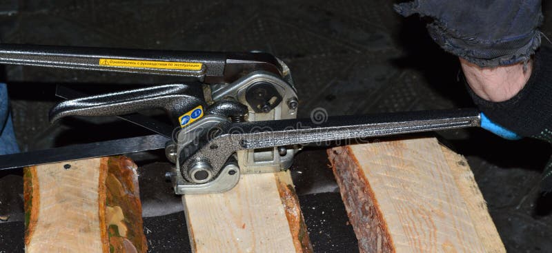 A Device for Fastening the Metal Strip on the Boxes with Products ...