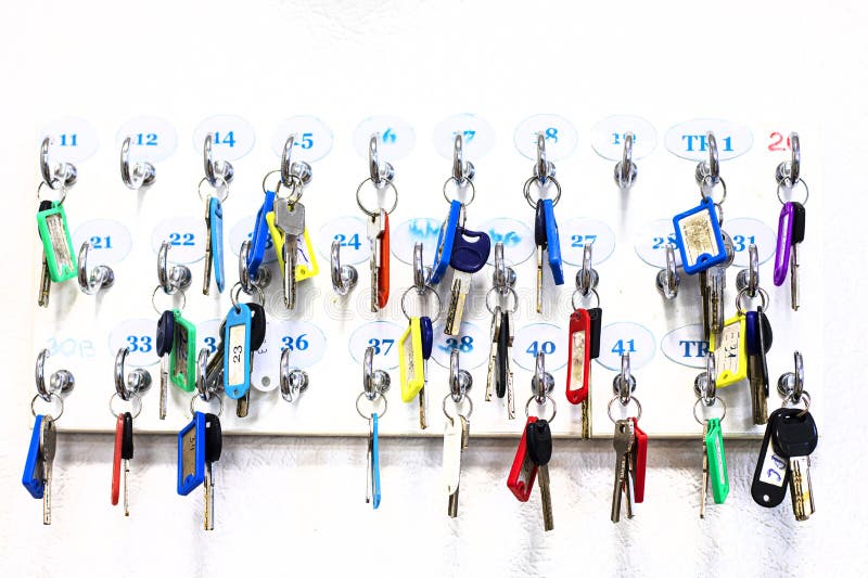 Device Hooks for Keys from Offices and Cabinets on a Light Wall in the ...
