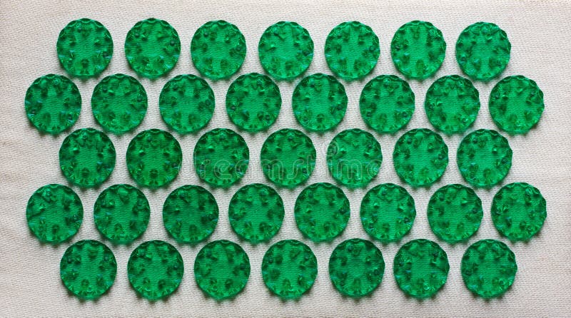 Green Plastic Bottle of Dishwashing Liquid and Red Sponge on Greenish ...