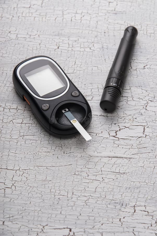Device for Measuring Blood Sugar on Table Stock Photo - Image of ...