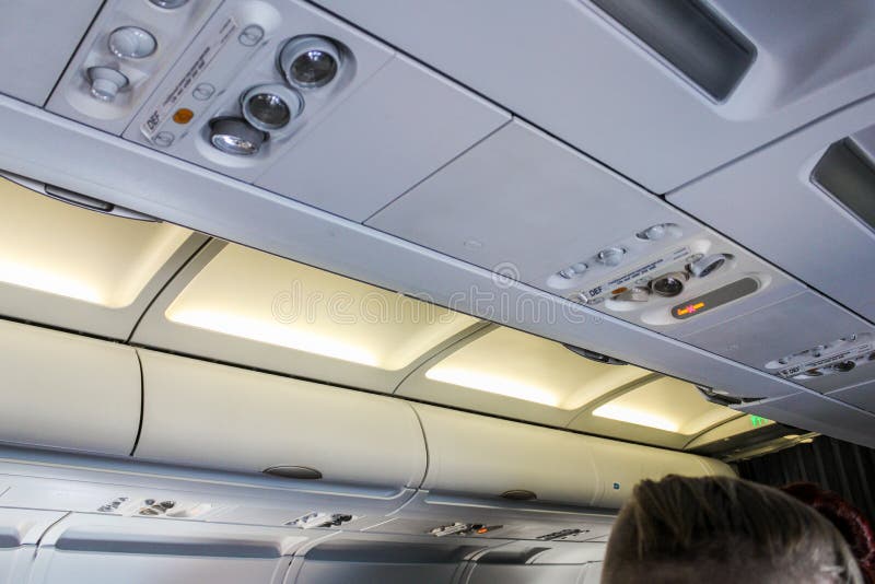 A Device Panel on the Ceiling of an Airplane Editorial Photo - Image of ...