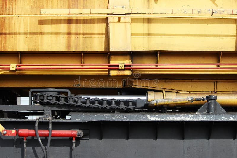 The Device of a Yellow Loader on the Railway. Hydraulic System. Stock ...