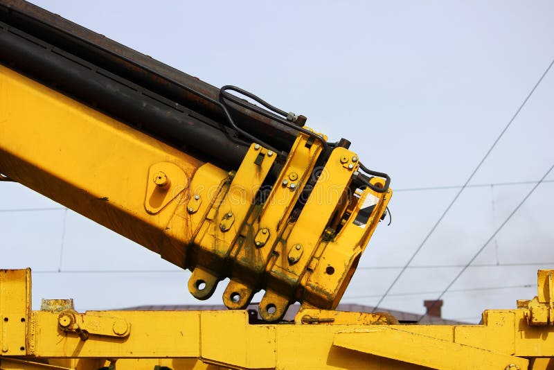 The Device of a Yellow Loader on the Railway. Hydraulic System. Stock ...