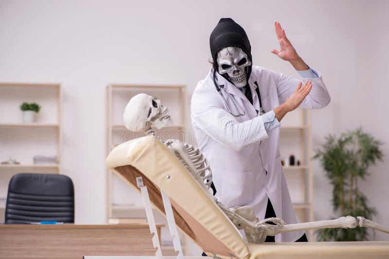 Devil Doctor Examining Skeleton Patient Stock Image - Image of evil ...