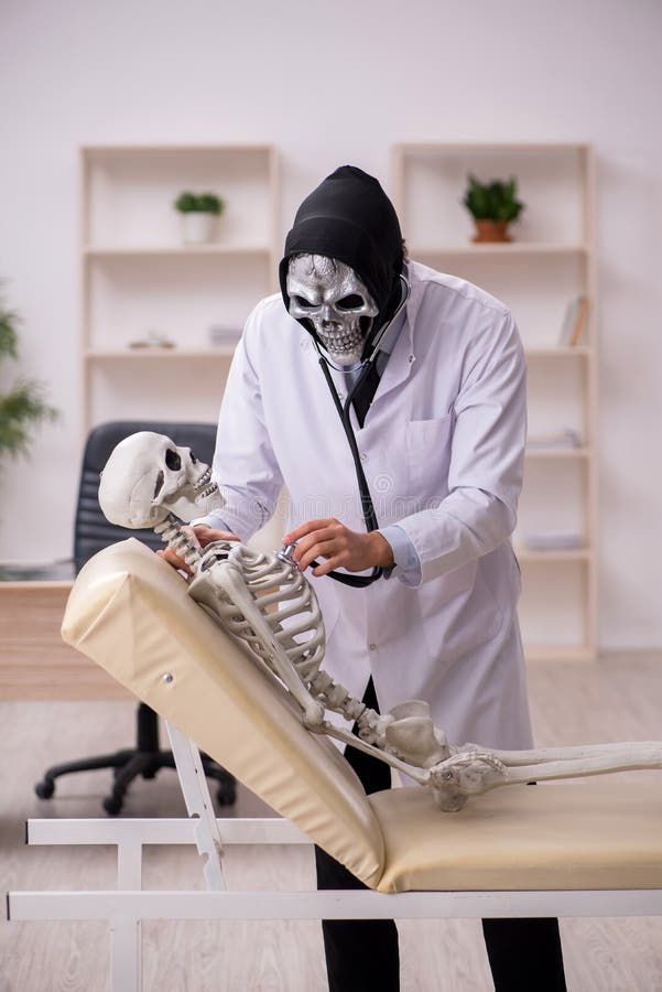Devil Doctor Examining Skeleton Patient Stock Image - Image of ...
