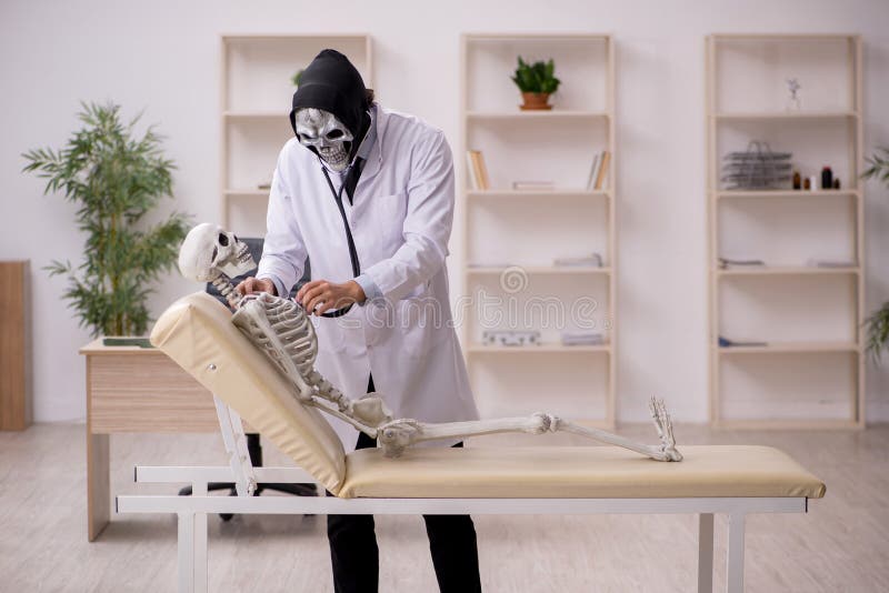 Devil Doctor Examining Skeleton Patient Stock Image - Image of ...