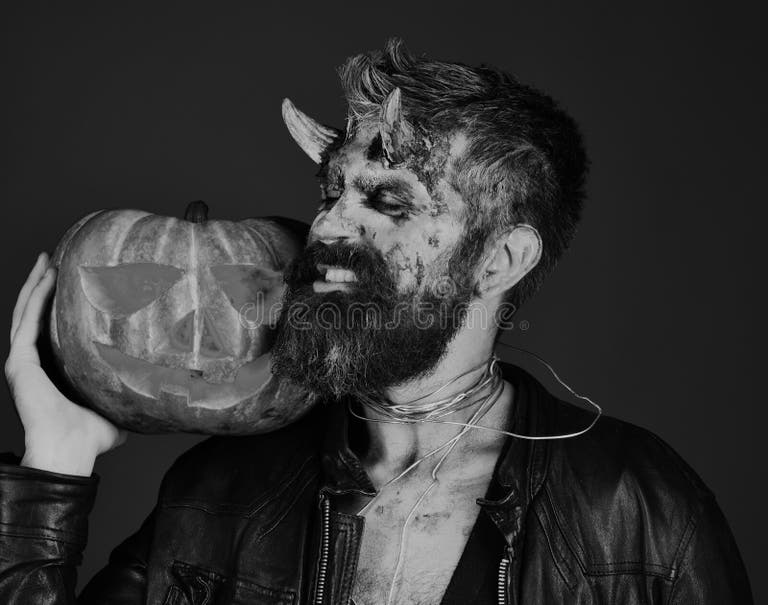 Devil or Monster with October Decorations. Demon with Demonic Face ...