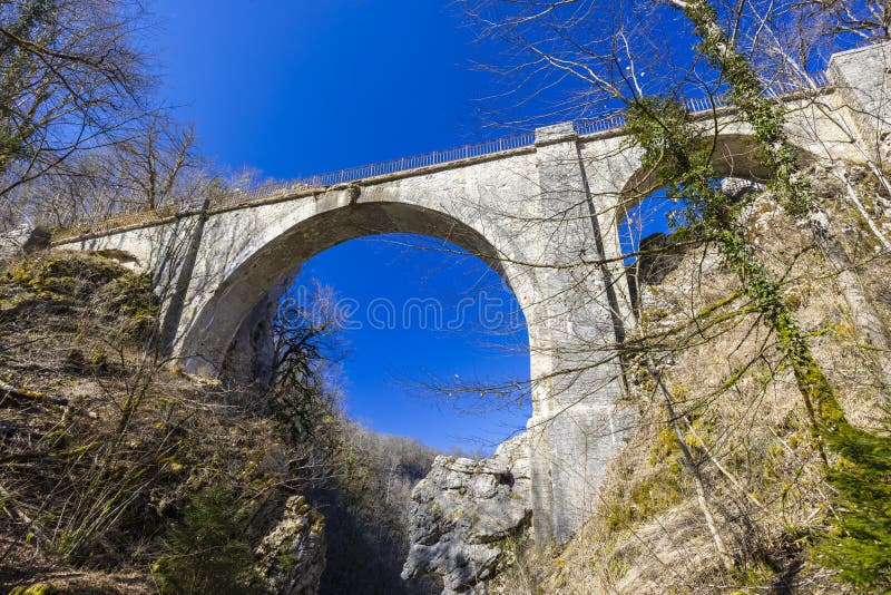 Devil S Bridge Arching Over the Loue River in Crouzet Migette, Doubs ...