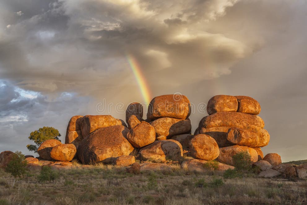 Devil S Marbles in Northern Territory and a Rainbow on the Background ...