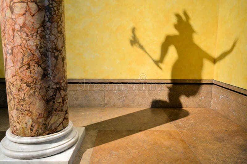 Devil s shadow on the wall stock photo. Image of alien - 45821122