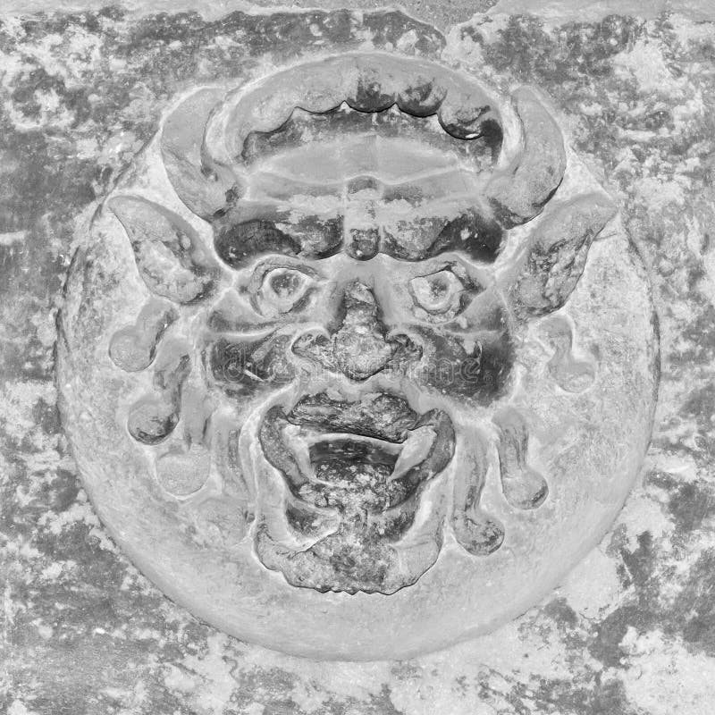 Devil stone on the wall stock photo. Image of stone, fright - 64700684