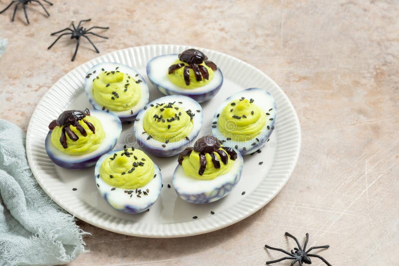 Deviled eggs with avocado stock image. Image of yellow - 290031685