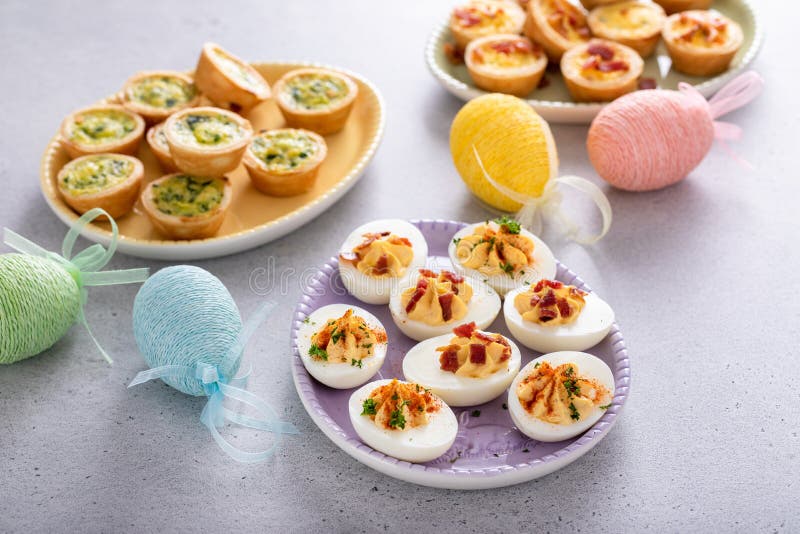 Deviled Eggs and Mini Quiches, Appetizers for Easter Stock Image ...