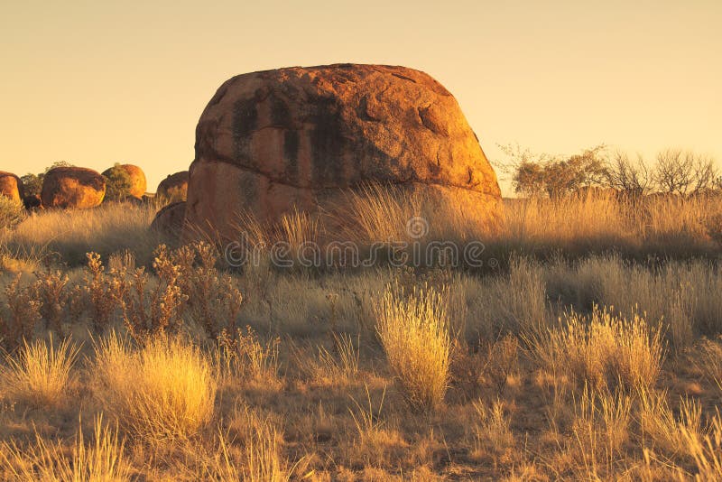 Devils Marbles stock image. Image of sunset, grass, marbles - 62309561