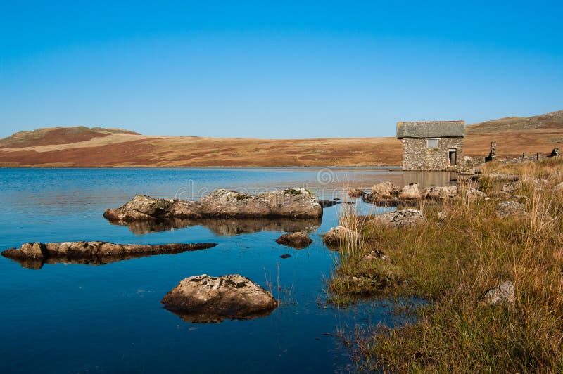 Devoke Water and boathouse stock image. Image of england - 16460395