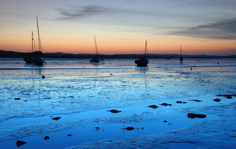 Devon Estuary stock image. Image of silhouette, orange - 9336353