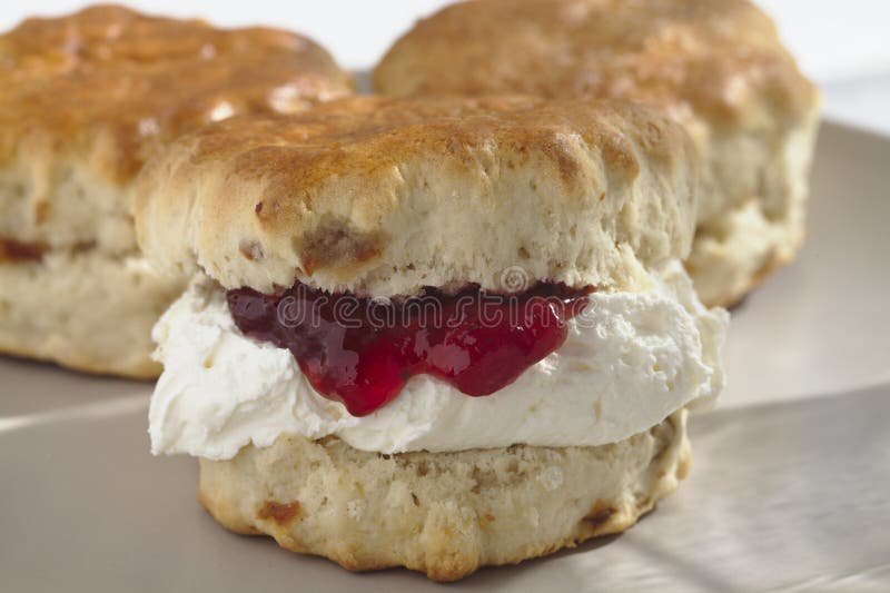 Devonshire Scone with Cream and Jam Stock Photo - Image of scones ...