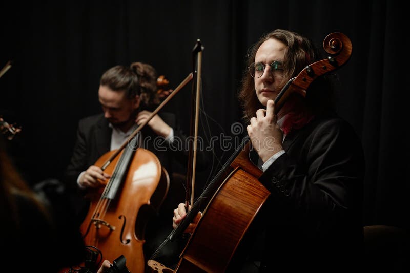 Devoted Cellists Performing Symphony in Chamber Ensemble Stock Image ...