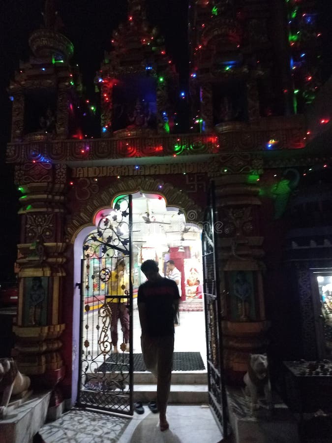 A Devotee is Seen at the Gate of a Temple Editorial Stock Image - Image ...