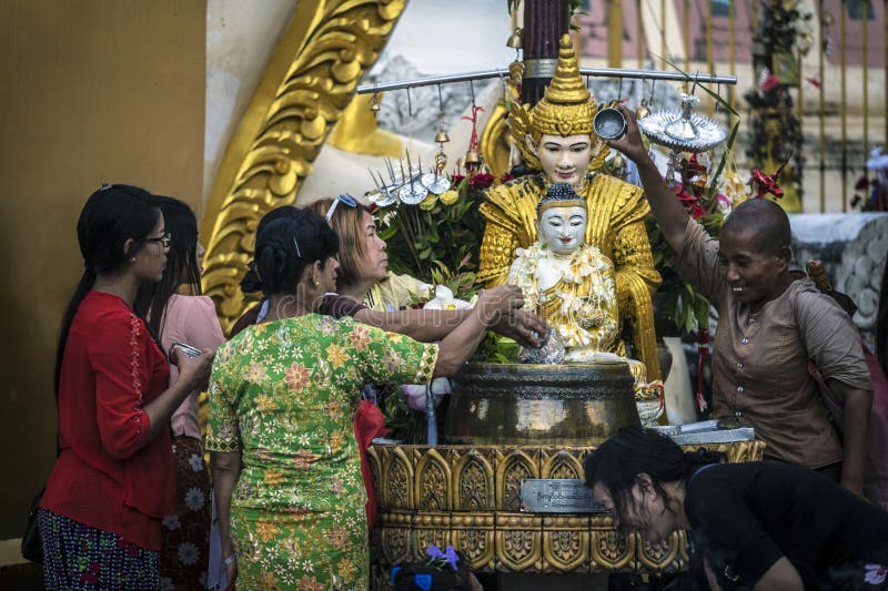 Devotees Performing Water Pouring Ritual, Myanmar Editorial Stock Photo ...