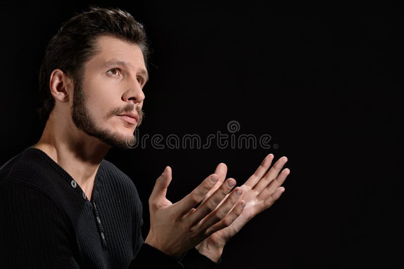 Devout Man. Portrait of Devout Bearded Man Praying and Holding H Stock ...
