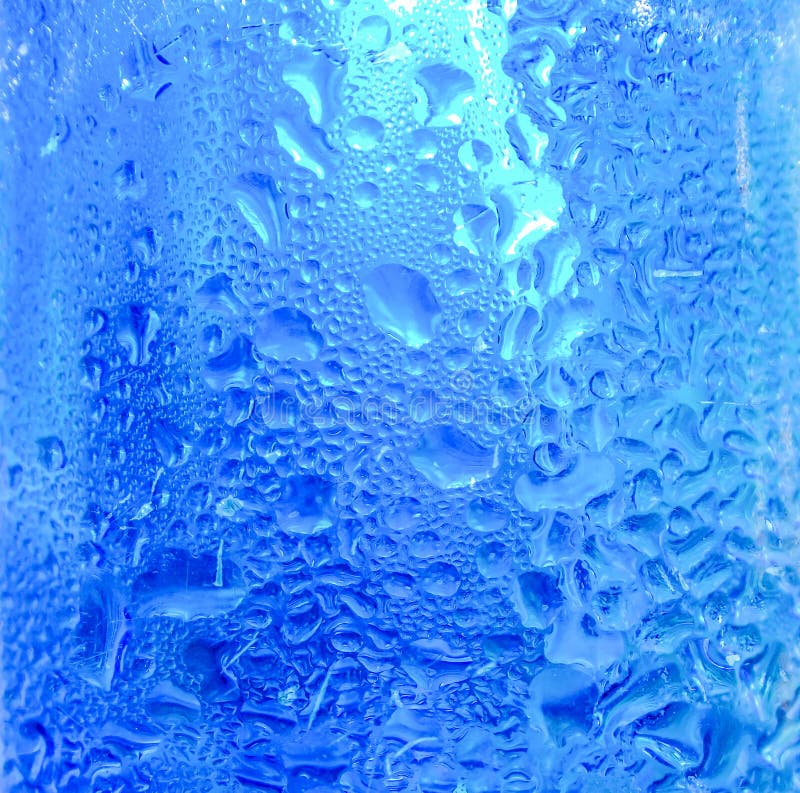 Dew on the blue glass stock image. Image of water, glass - 227859851