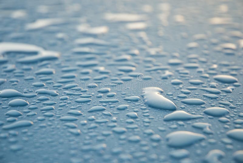Dew Drops on Blue Metallic Surface Stock Image - Image of rain, liquid ...