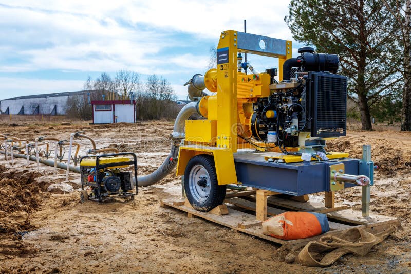 Dewatering Works. Pump for Pumping Water Outdoors Stock Photo - Image ...