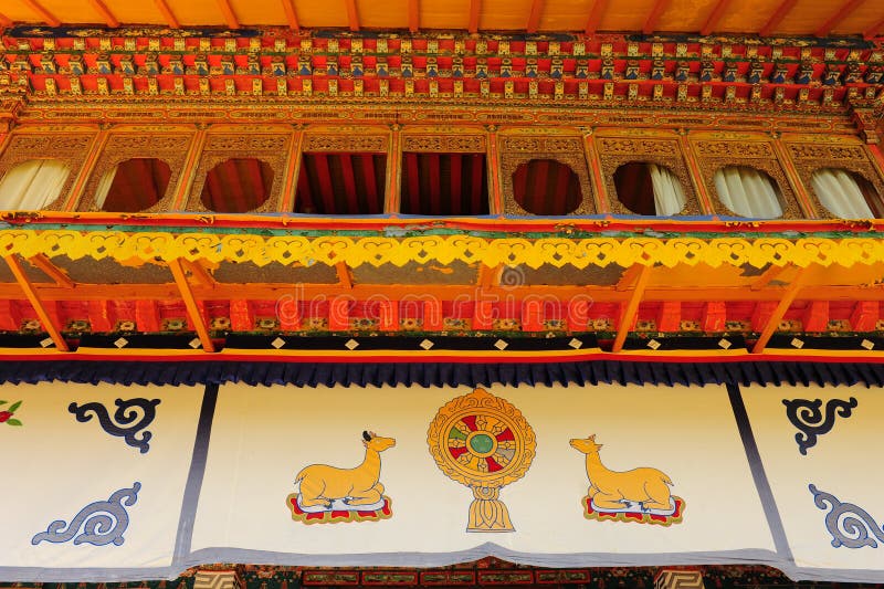 A Dharma-cakra between Two Kneeling Goats Stock Photo - Image of ...