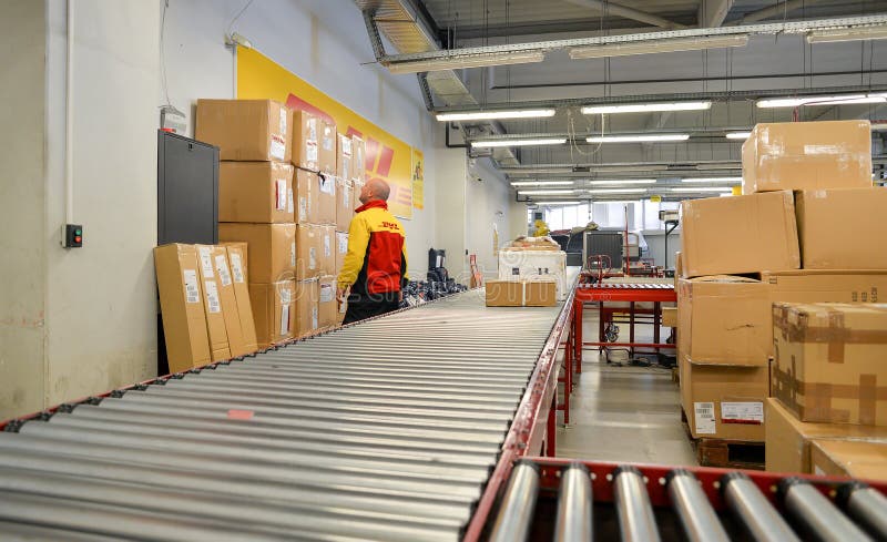 Package Conveyor Belt for Distributing Packages in DHL Storehous ...