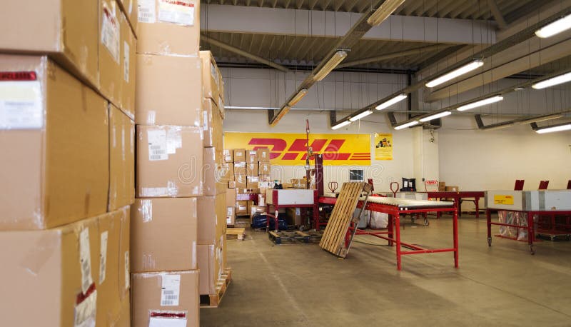 DHL Warehouse with Package Boxes of Different Size Editorial Stock ...