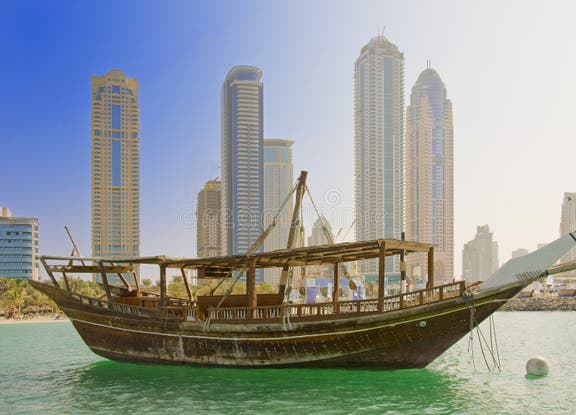Dhow and Buildings stock photo. Image of dhow, gulf, boat - 3852302