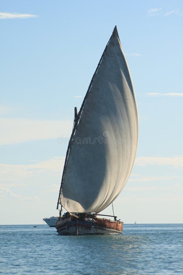 Mozambican dhow at sunset stock image. Image of coastal - 2577437