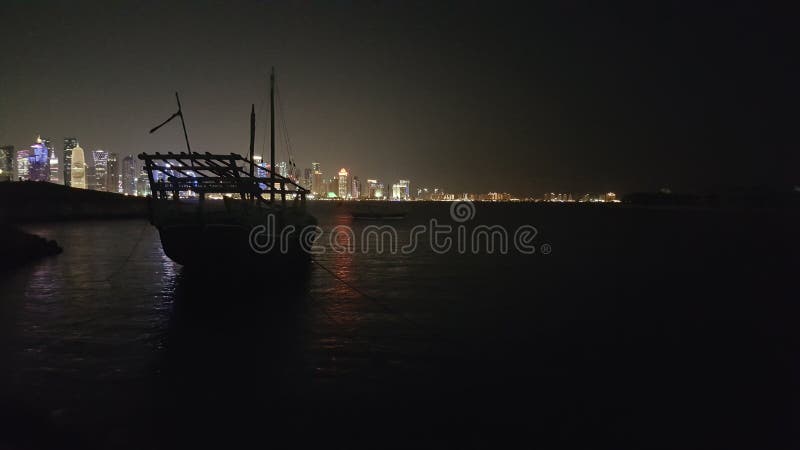 Dhow with Doha skyline. stock image. Image of waterway - 103410203