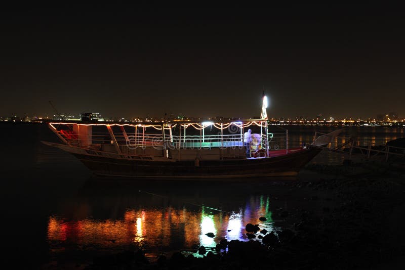 Dhow at Night and Reflection Stock Image - Image of dhow, night: 17664075