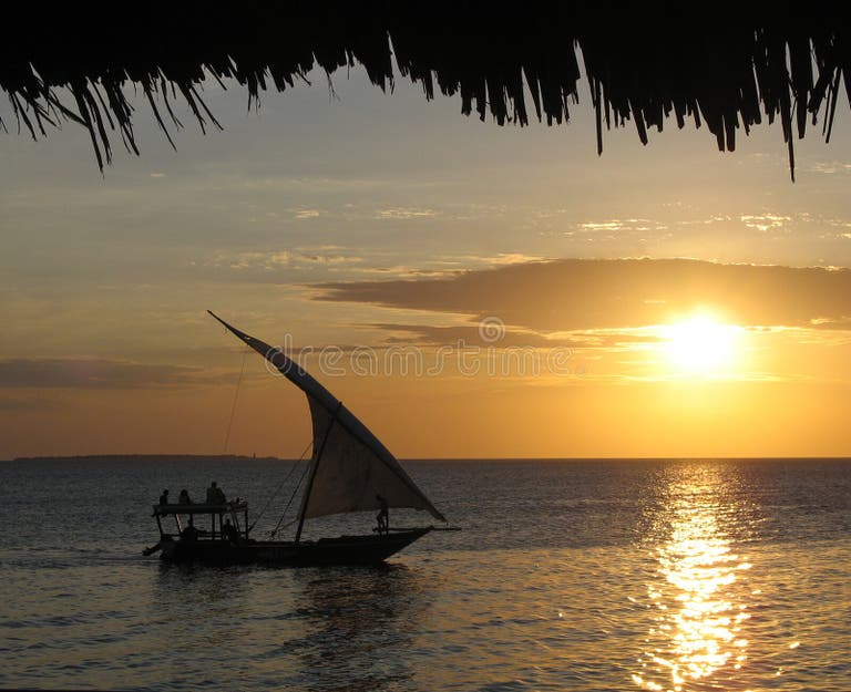 Dhow at sunset stock photo. Image of sail, island, silhouette - 3518804