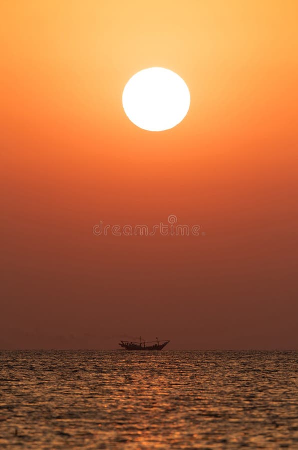 Sunset at Busaiteen Sea Beach, Bahrain Stock Image - Image of cloud ...