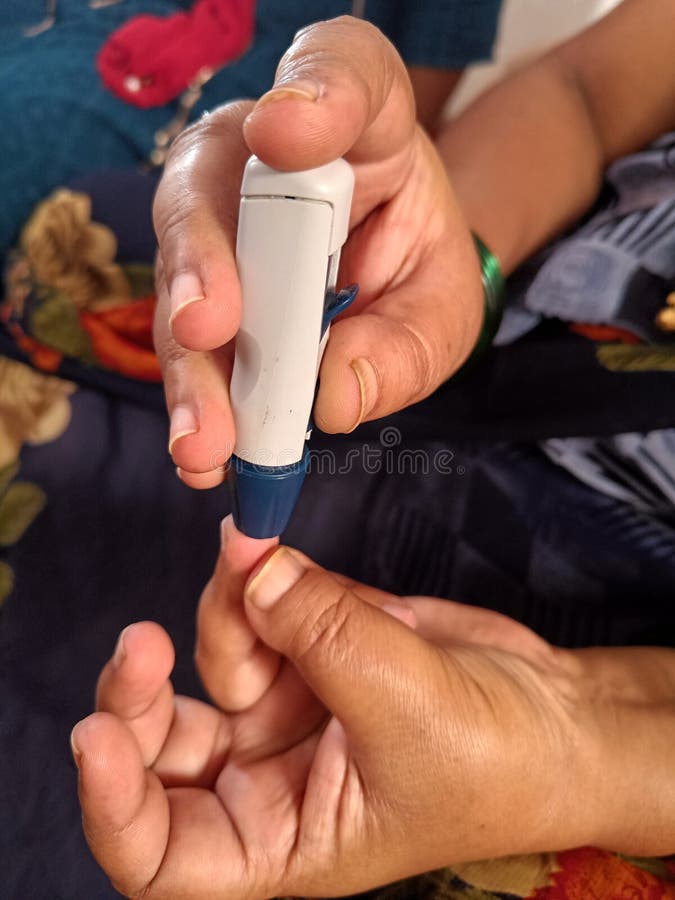 Diabetic Patient Checking Sugar Level by Machine Stock Image - Image of ...