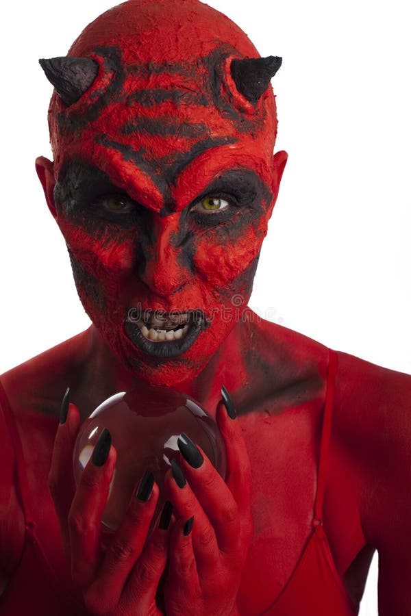 Diable Rouge Avec La Bille En Cristal. Image stock - Image du ...