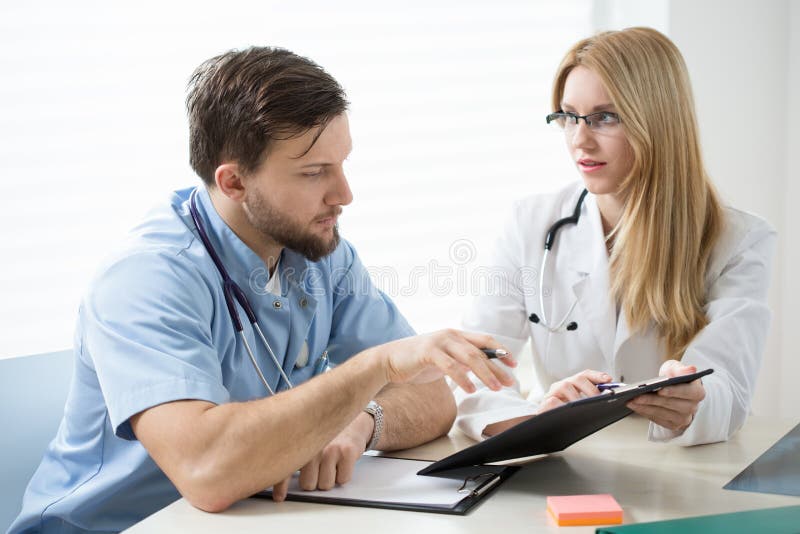 Diagnosing the patient stock photo. Image of medical - 57884426