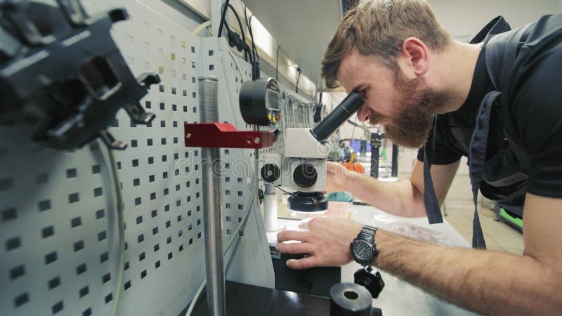 Diagnostics of Diesel Injectors Under a Microscope. the Master Examines ...
