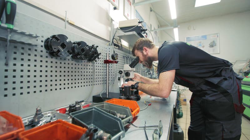 Diagnostics of Diesel Injectors Under a Microscope. the Master Examines ...