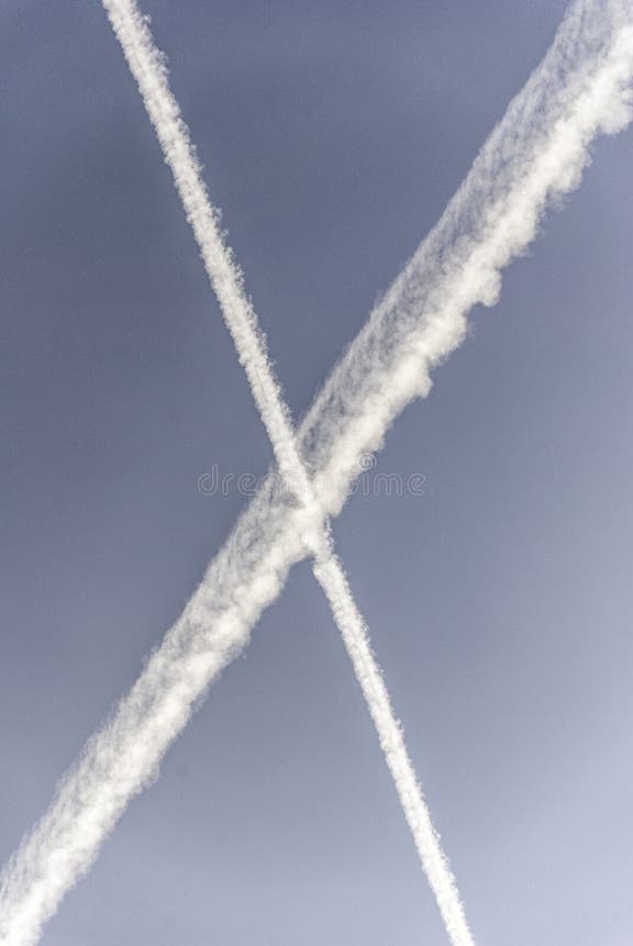 Diagonal Airplane Trace on a Clear Blue Sky Stock Photo - Image of ...
