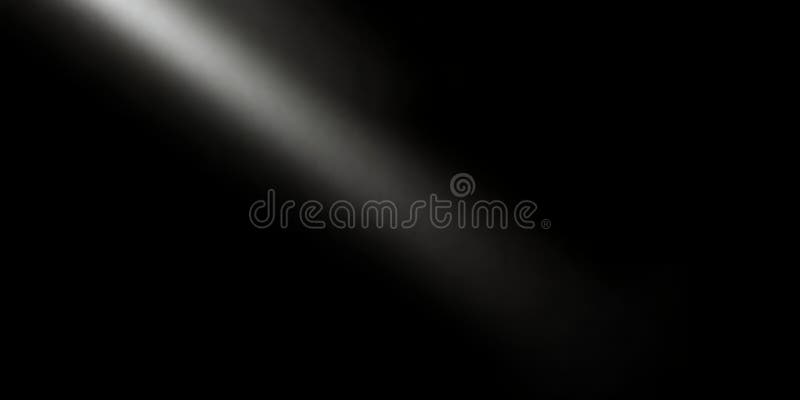 A Diagonal Beam of Light Shining Across a Dark Background Creating a ...