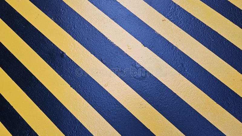 Diagonal Black and Yellow Stripes Create a Bold Pattern Across a ...