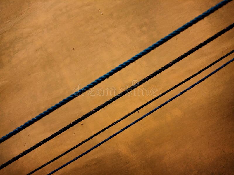 Diagonal Cable on Yellow Background Stock Image - Image of line, lines ...