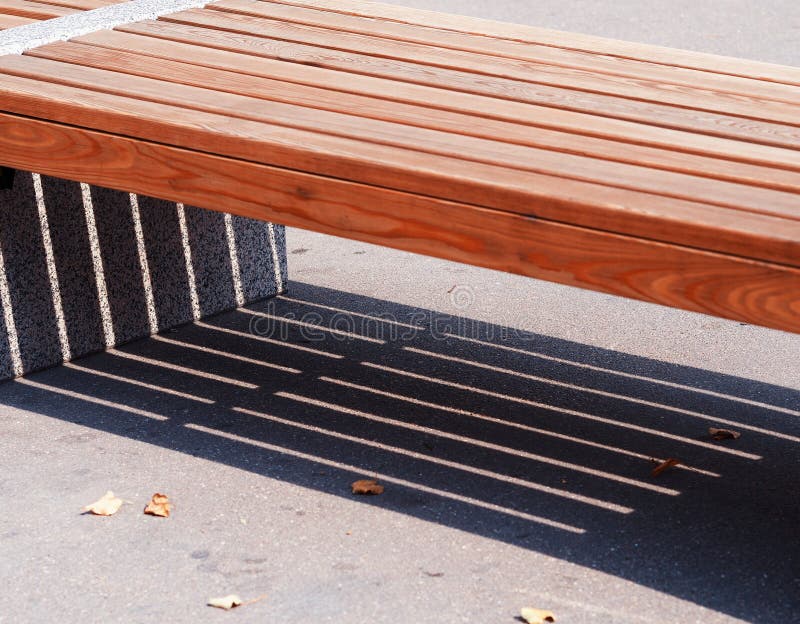 Diagonal City Bench with Dramatic Shadow Backdrop Stock Photo - Image ...