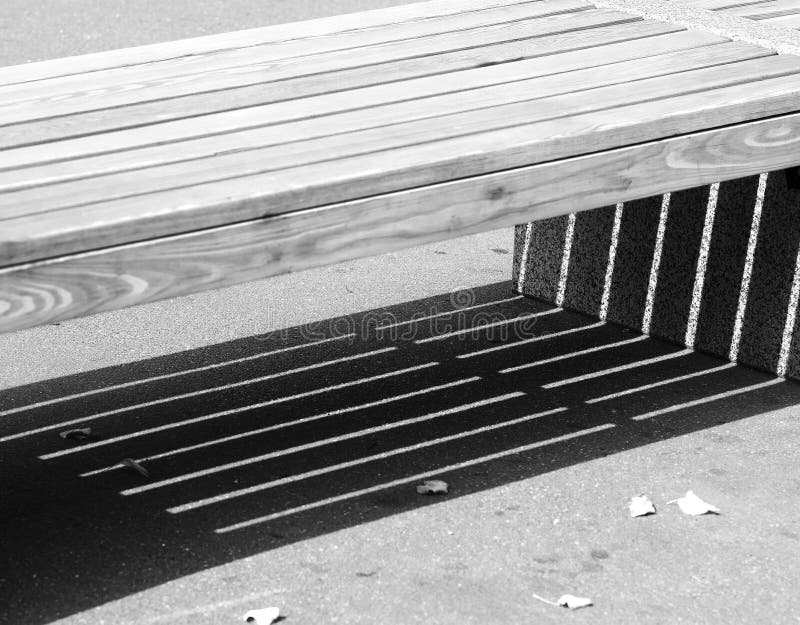 Diagonal City Bench with Dramatic Shadow Stock Photo - Image of autumn ...