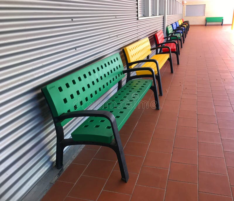 Color benches in a row stock image. Image of composition - 367224605
