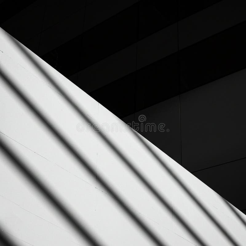 Diagonal Lines of Light and Shadow Create a Dramatic Contrast Across a ...